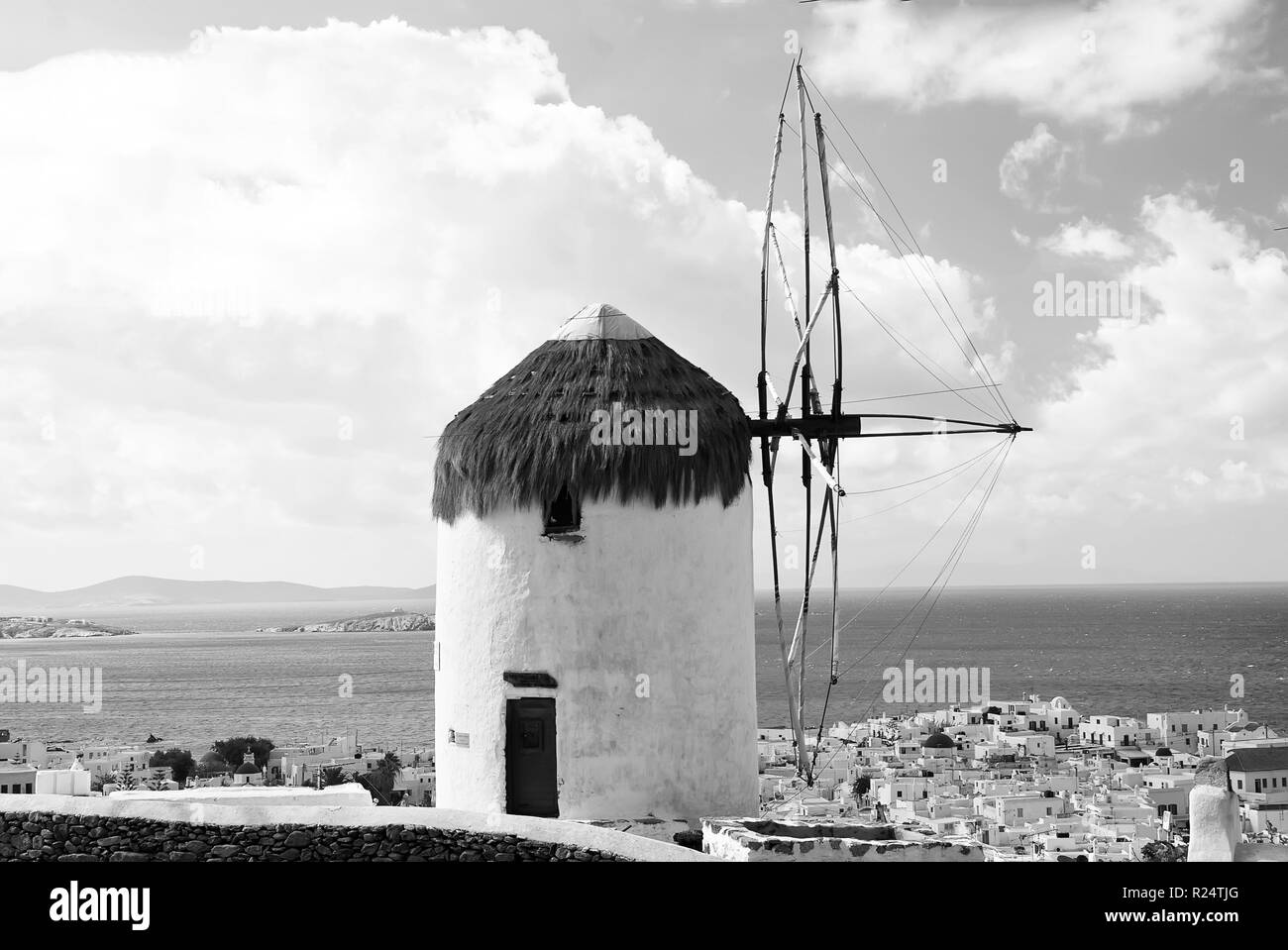Building with sail and straw roof in Mykonos, Greece. Windmill on ...