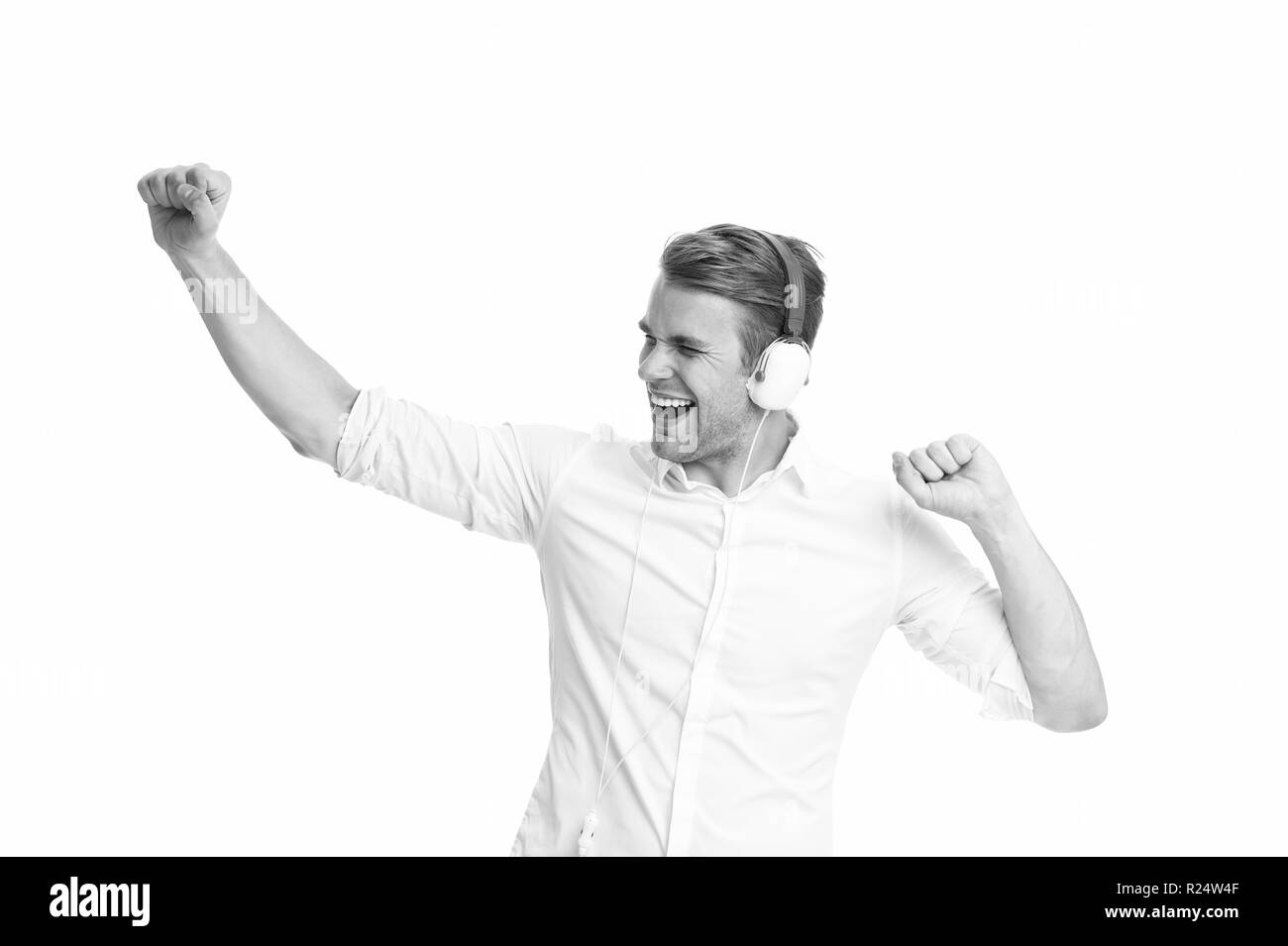 Dancing music. Man listening favourite song in headphones and dancing ...