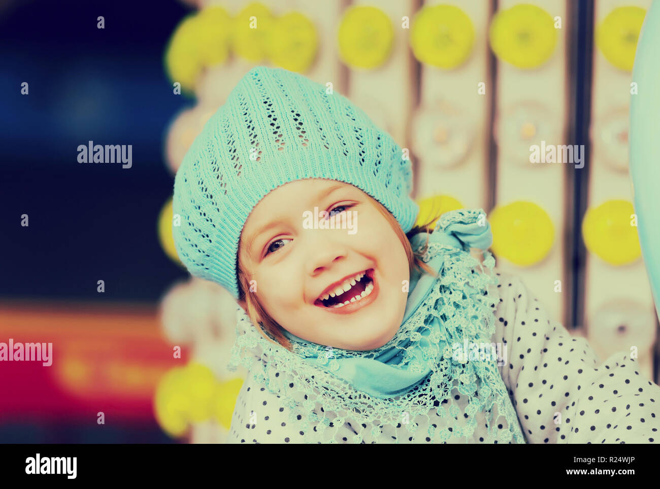 little child having ride on the merry-go-round Stock Photo - Alamy