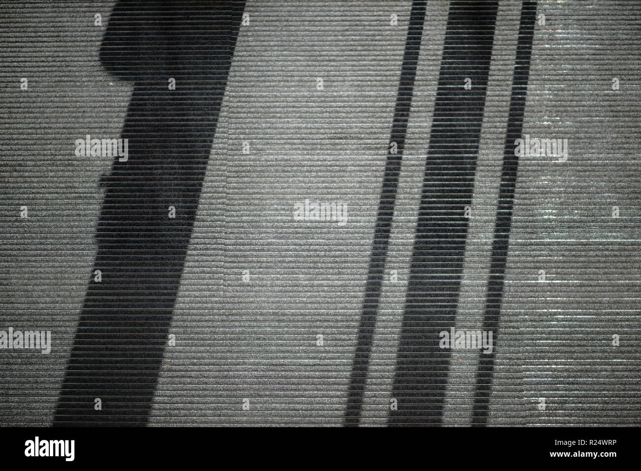 The closeup and top view of a corridor with gray carpeting and abstract ...