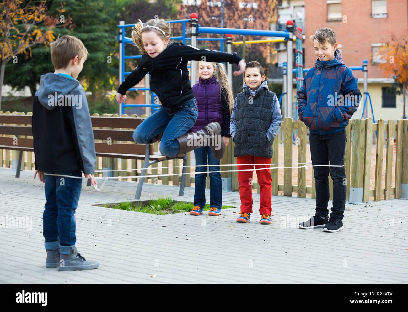 Children skipping in playground hi-res stock photography and images - Alamy