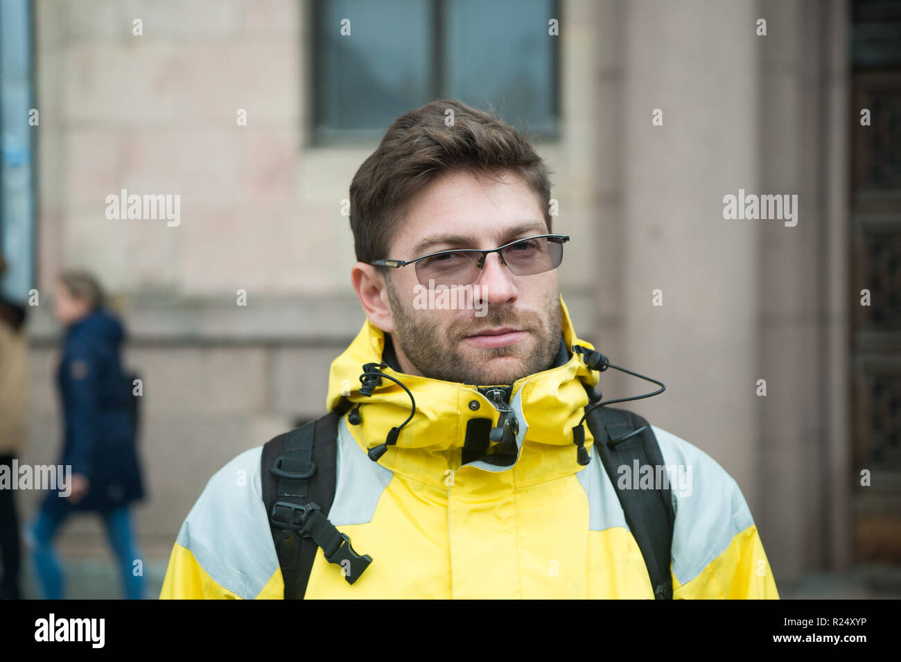 Man tourist wear warm protective clothes for cold climate conditions ...