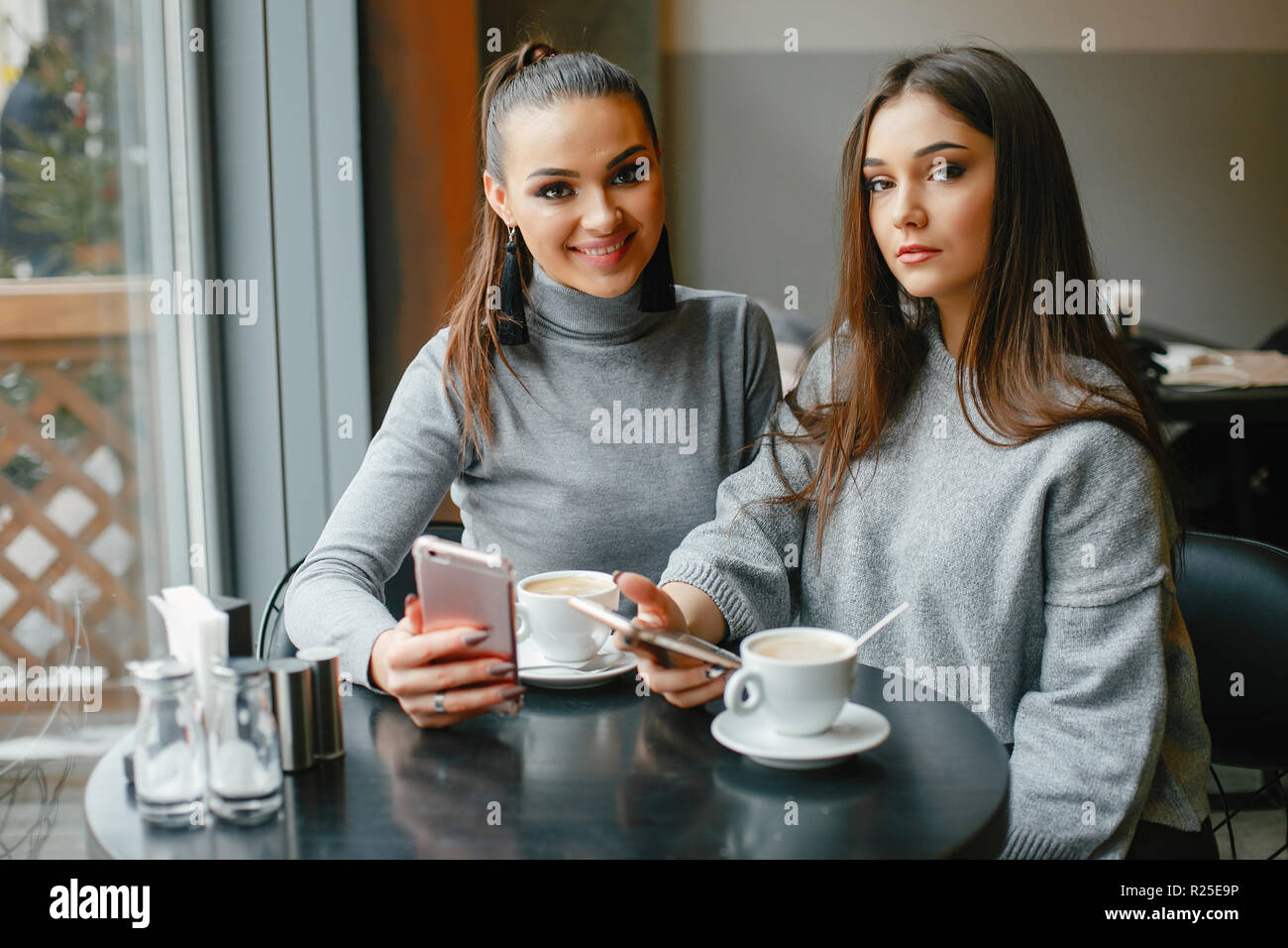 girls in a cafe Stock Photo - Alamy