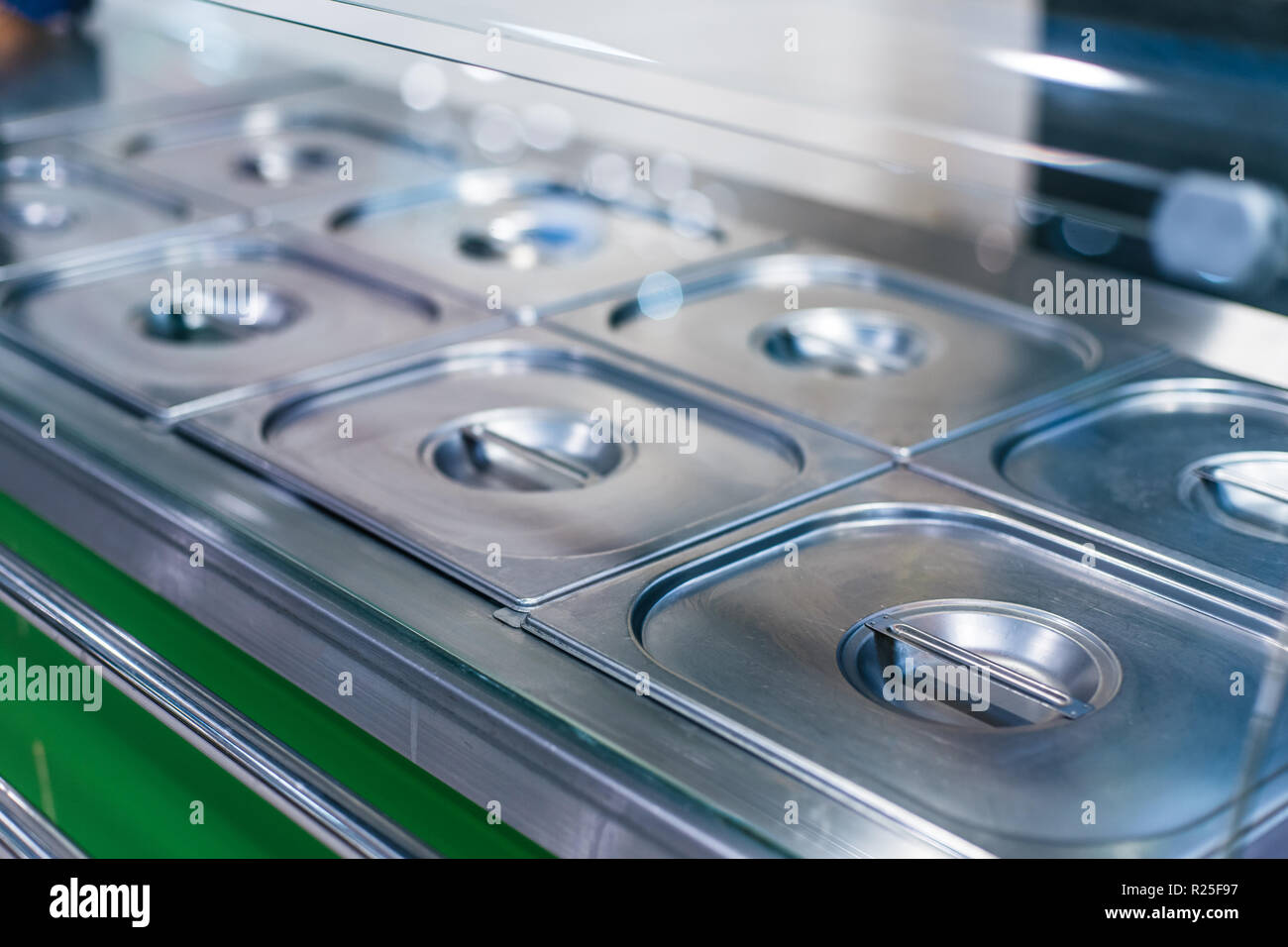 Metal polished buffet steel tray in fast food restaraunt Stock Photo ...
