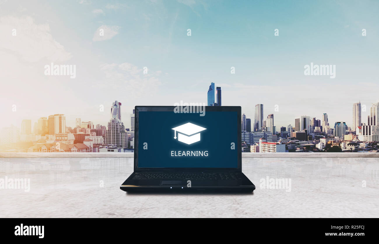 E-learning on computer laptop and city sunrise background. Online ...