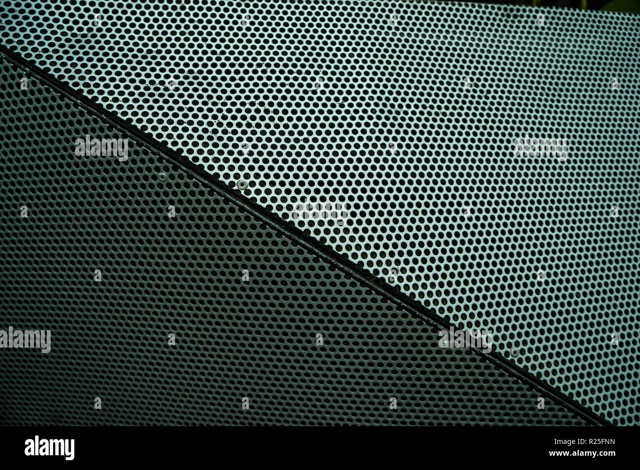 Perforated metal abstract hi-res stock photography and images - Alamy