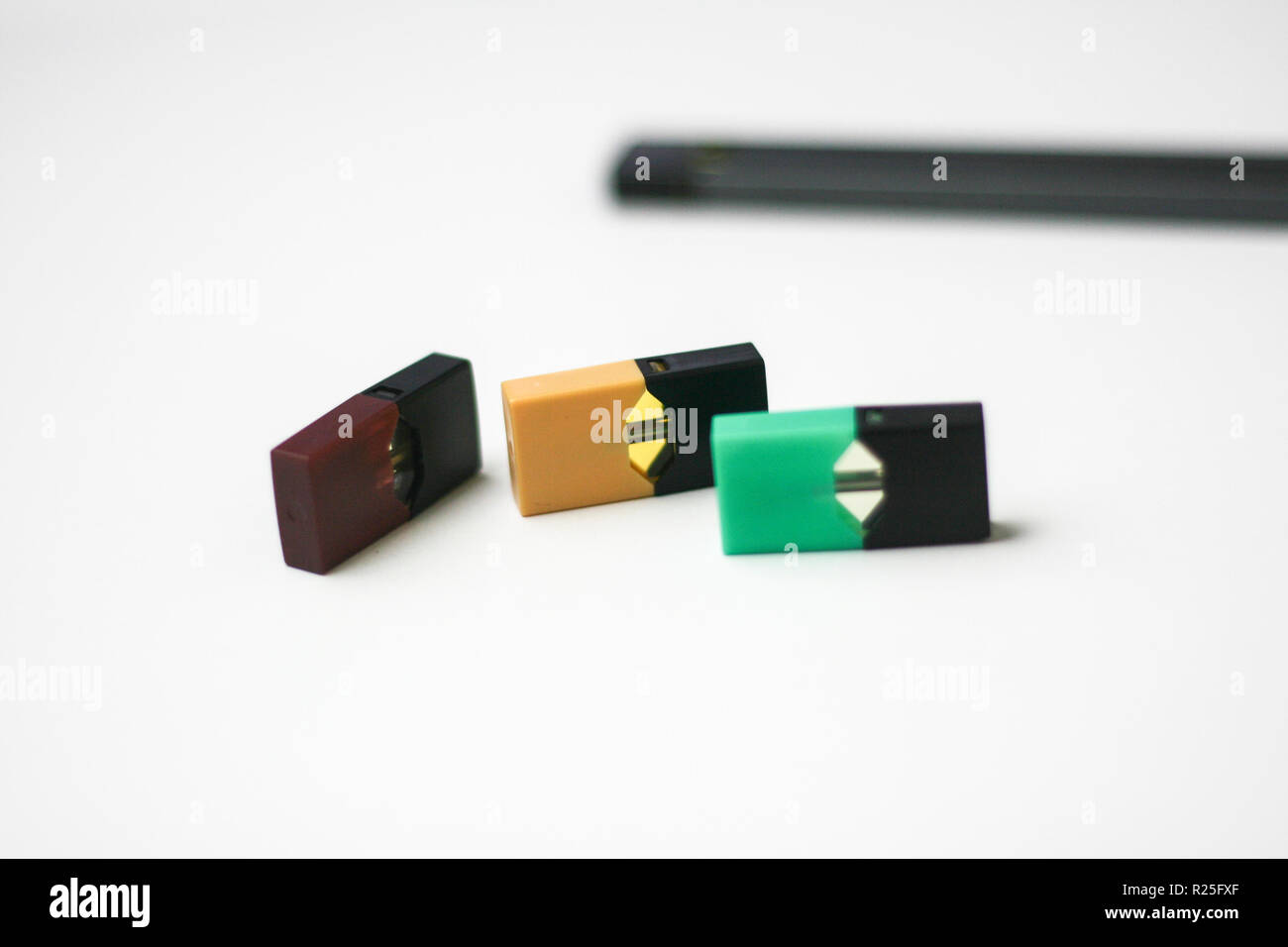 JUUL E-Cigarette and Flavor Pods on white background Stock Photo - Alamy