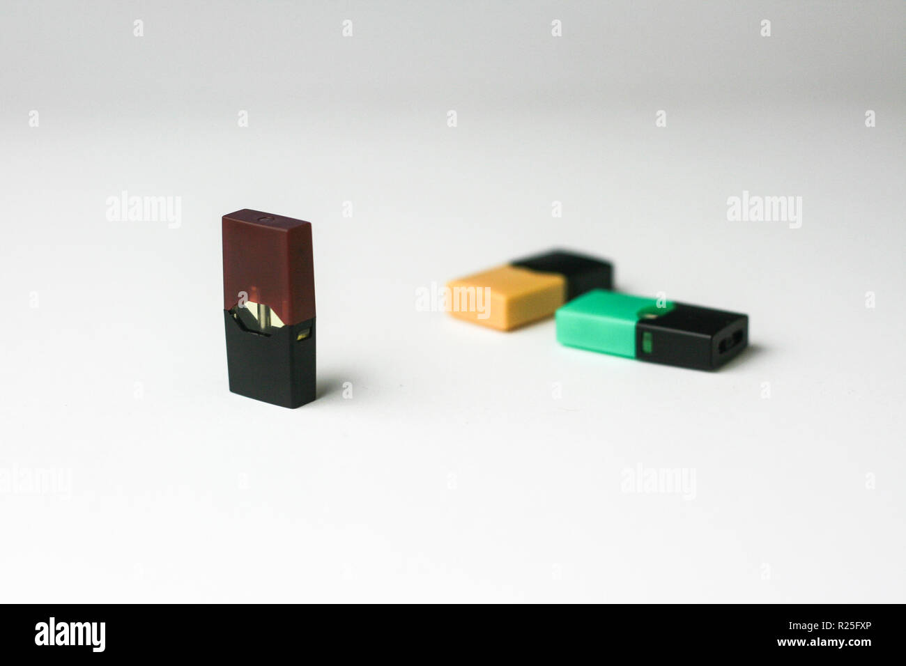 JUUL E-Cigarette and Flavor Pods on white background Stock Photo - Alamy