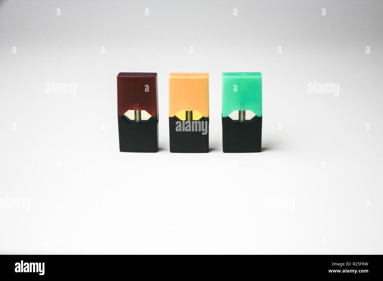JUUL E-Cigarette and Flavor Pods on white background Stock Photo - Alamy