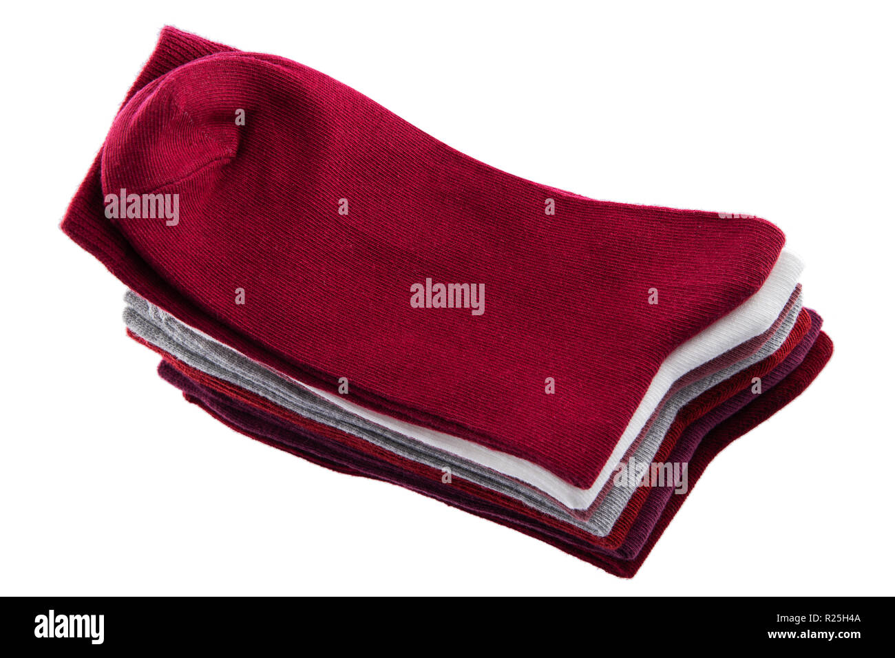 Colorful stack of new socks isolated on white background Stock Photo ...