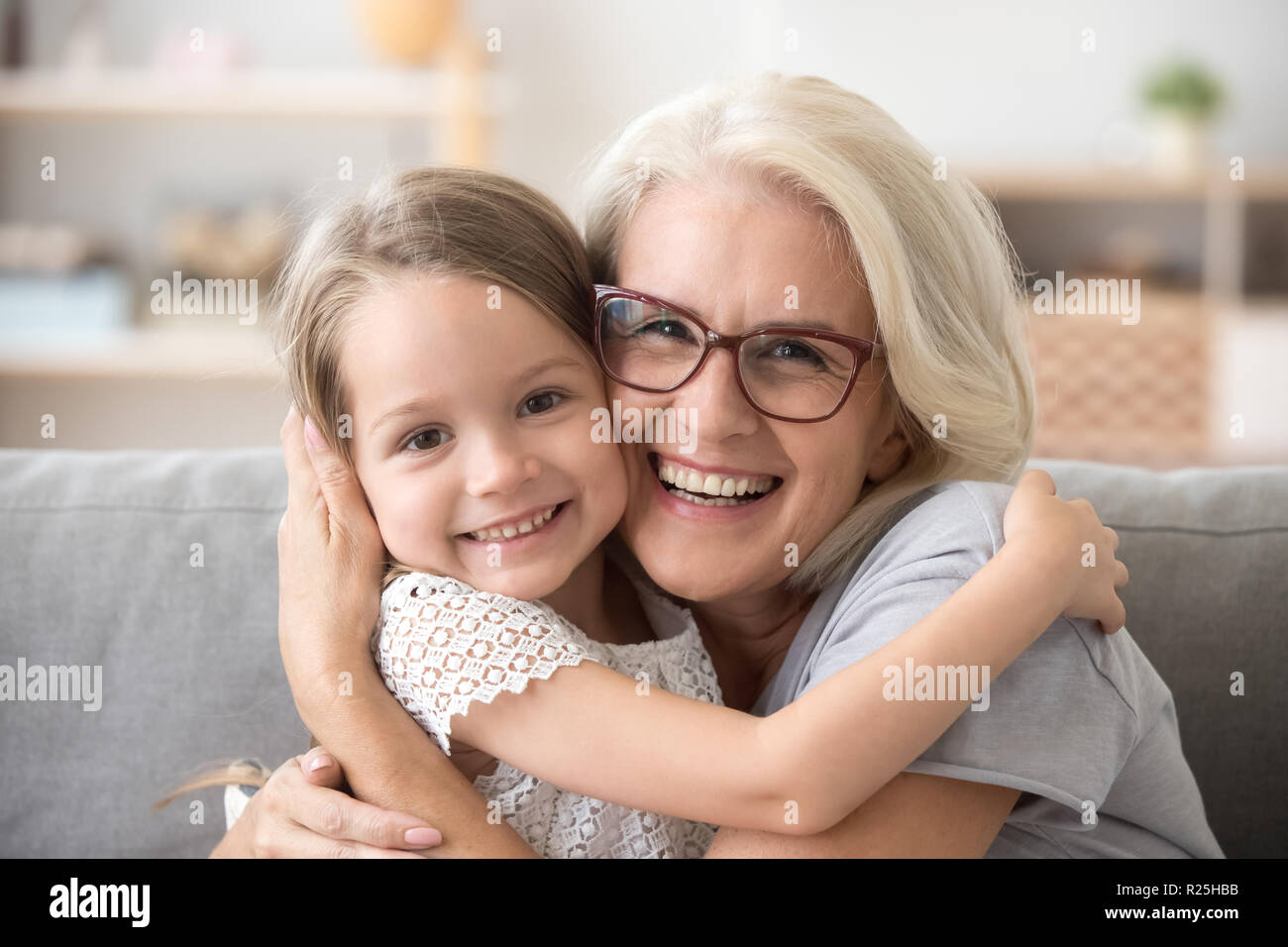Grandchild hugging hi-res stock photography and images - Alamy