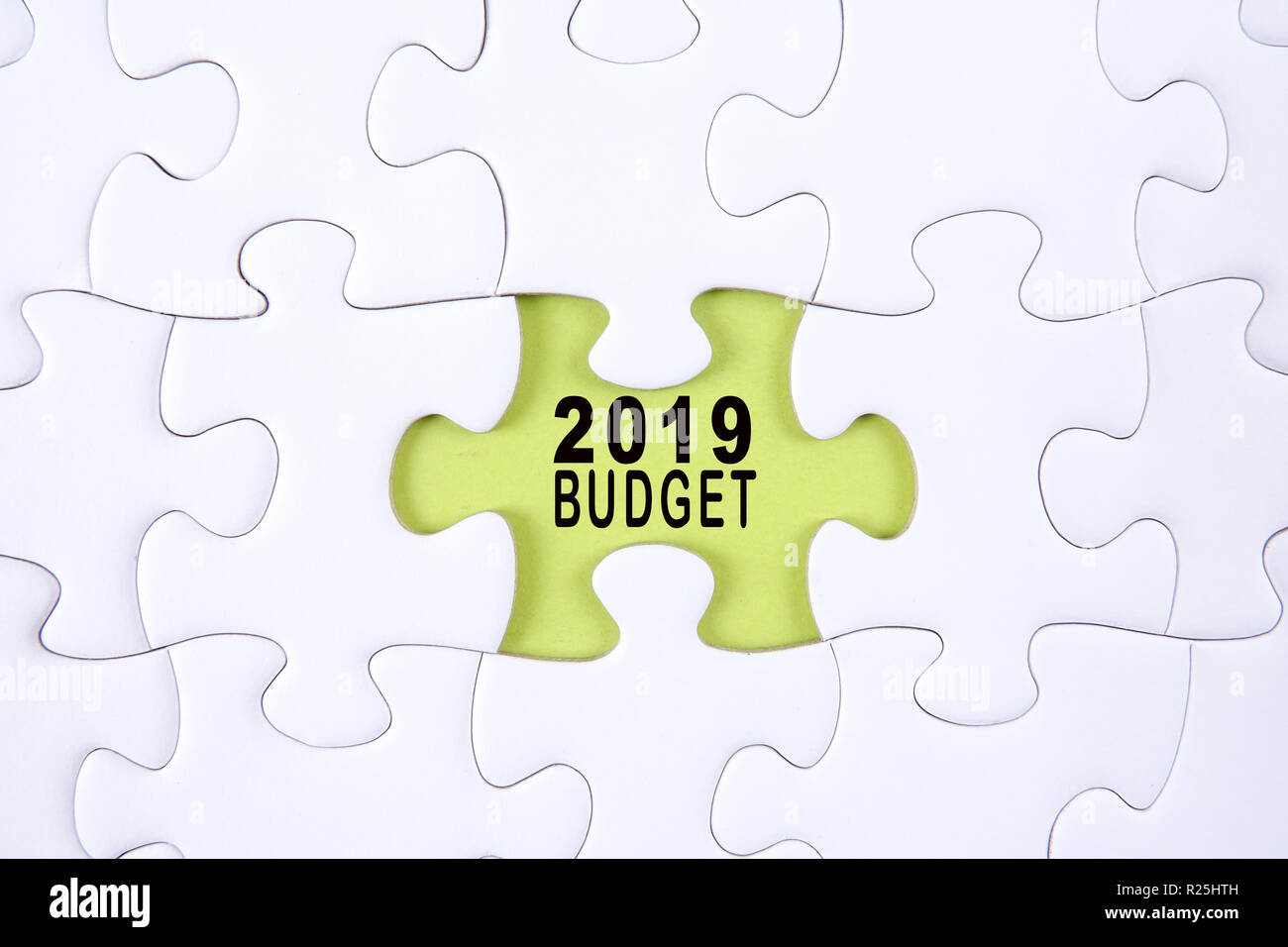 Business concept: 2019 BUDGET word on a jigsaw puzzle background Stock ...
