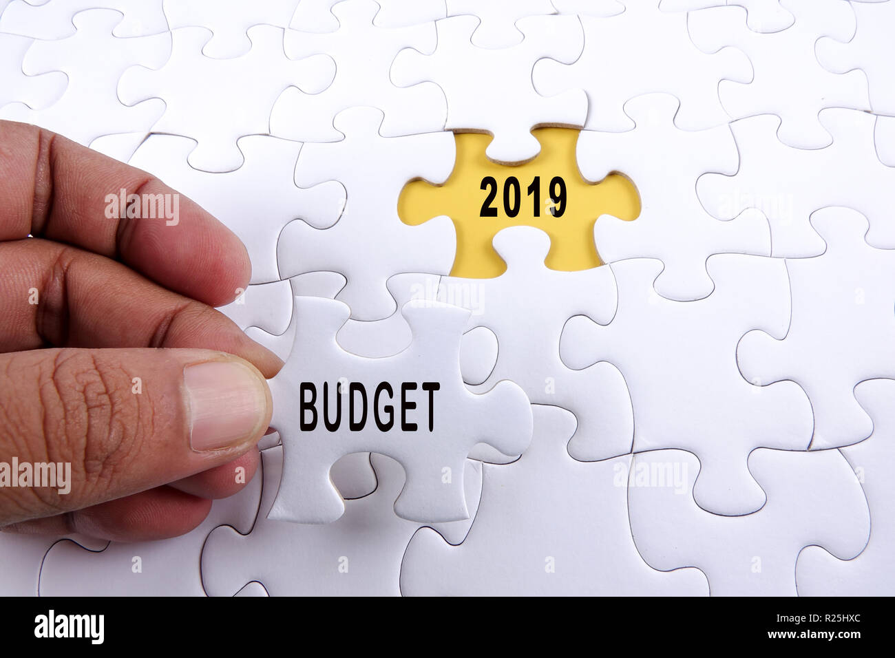 Business concept: 2019 BUDGET word on a jigsaw puzzle background Stock ...