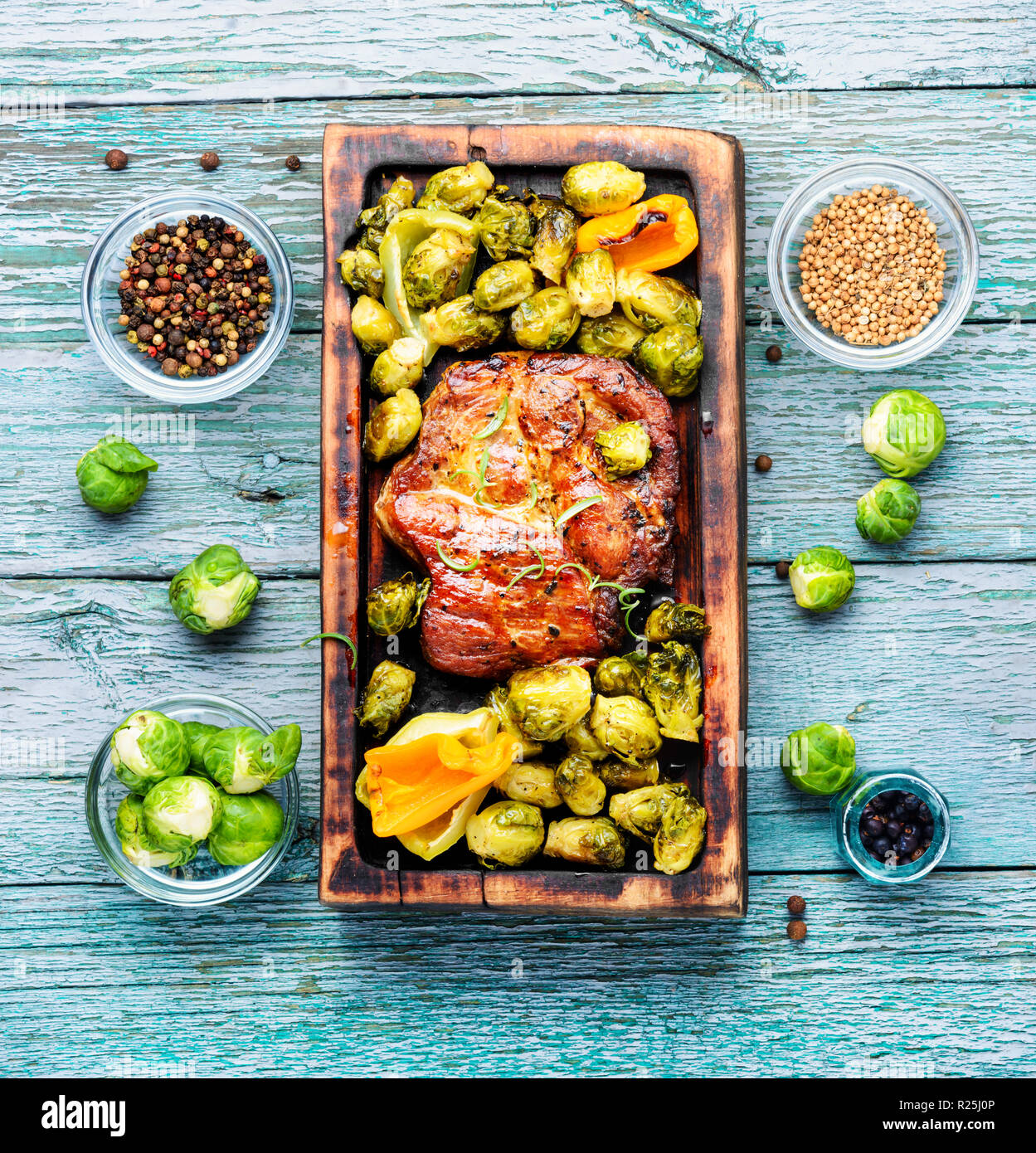 Grilled meat barbecue steak with brussels sprouts.Roast pork meat ...