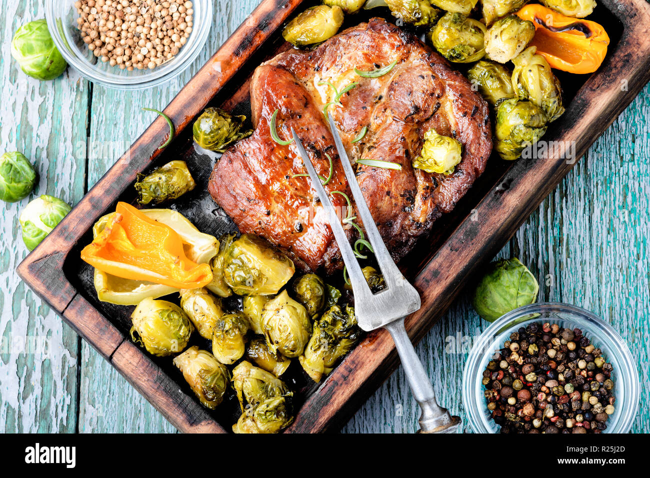 Grilled meat barbecue steak with brussels sprouts Stock Photo - Alamy