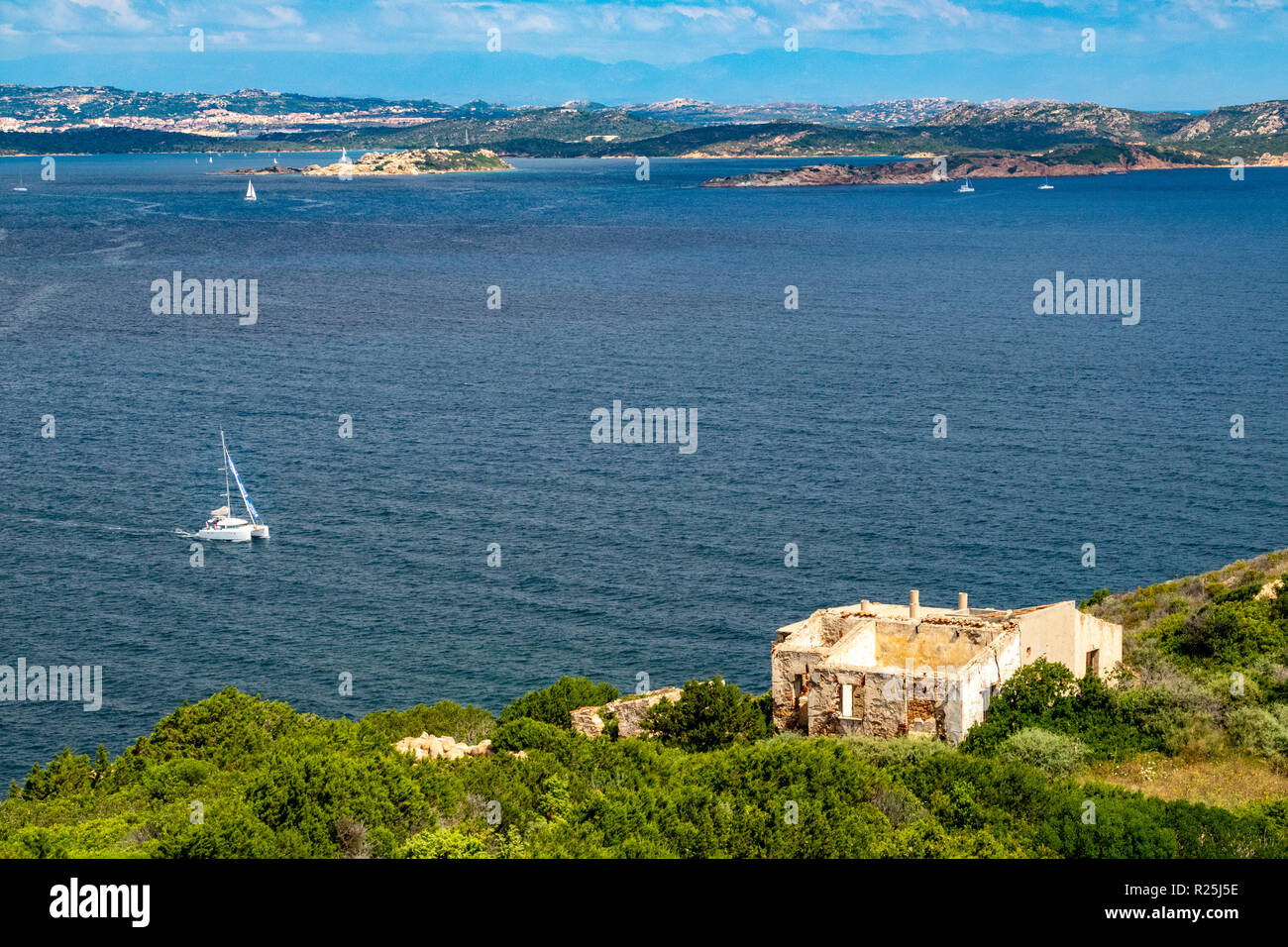 Colourful Granite Coastline with Ruins & Isola Caprera With Blue Sky ...