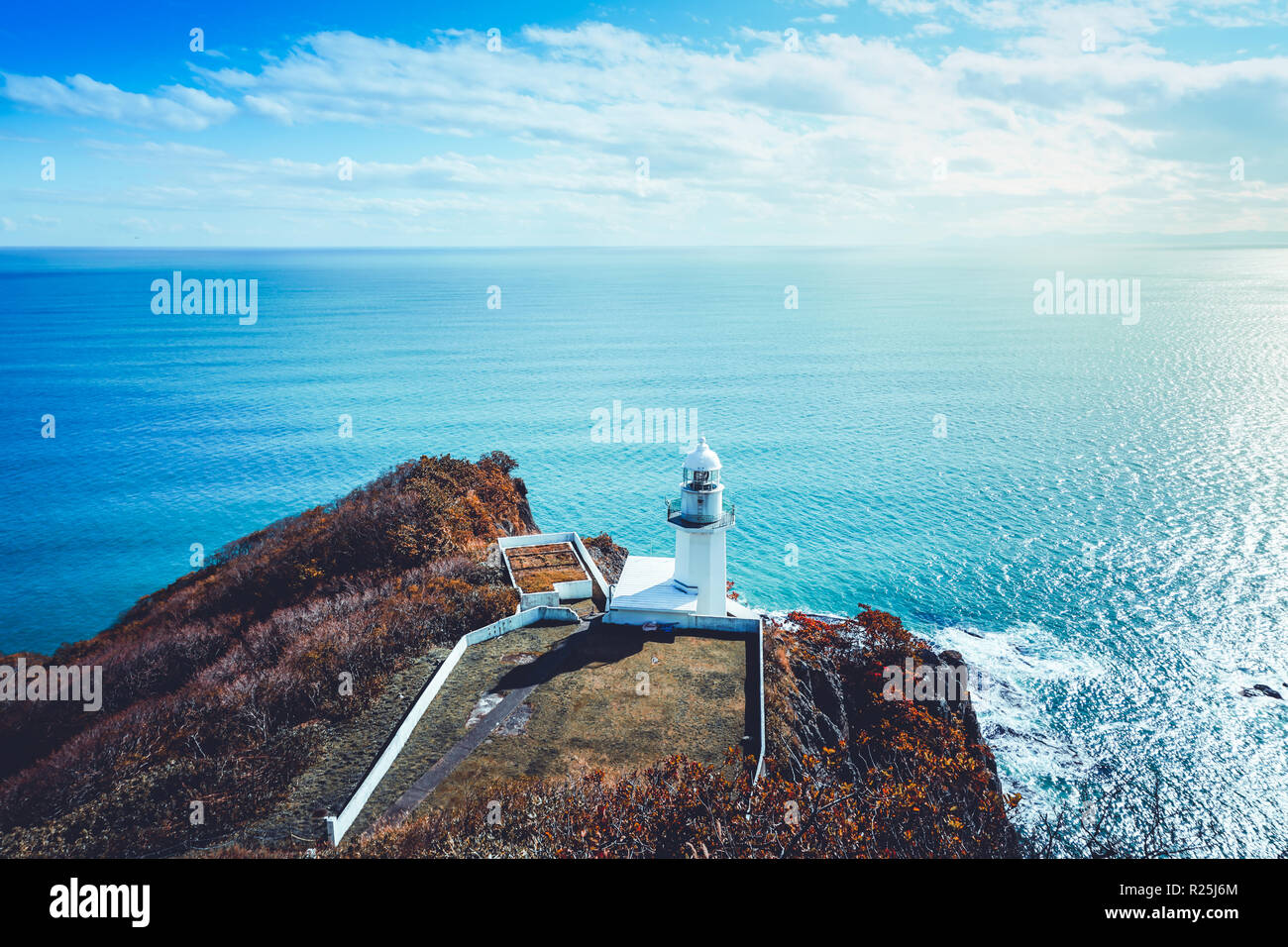 Lighthouse and ocean with blue sky at cape Chikyu Hokkaido Japan Stock Photo - Alamy