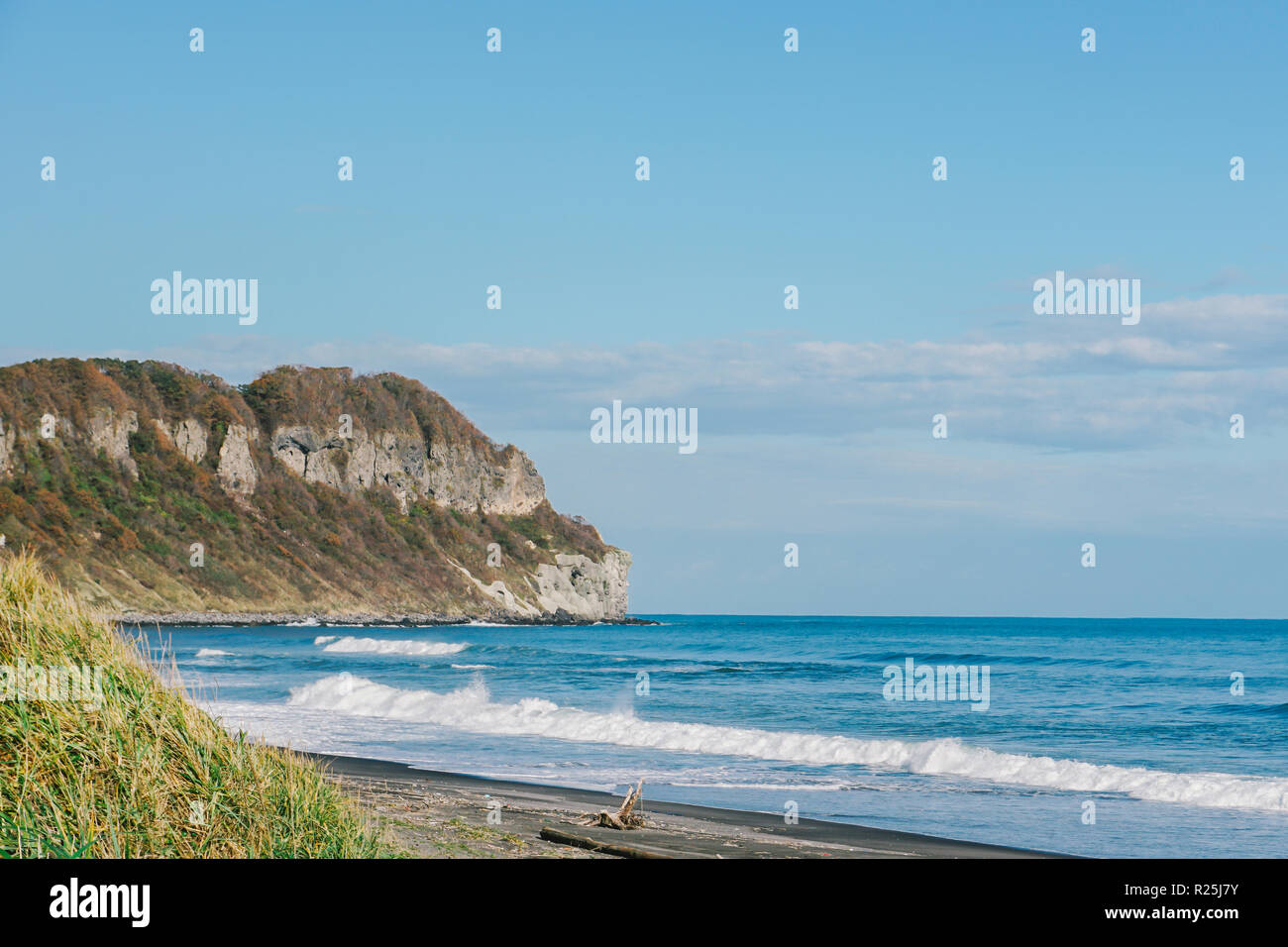 Beach and ocean with blue sky at cape Chikyu Hokkaido Japan Stock Photo - Alamy