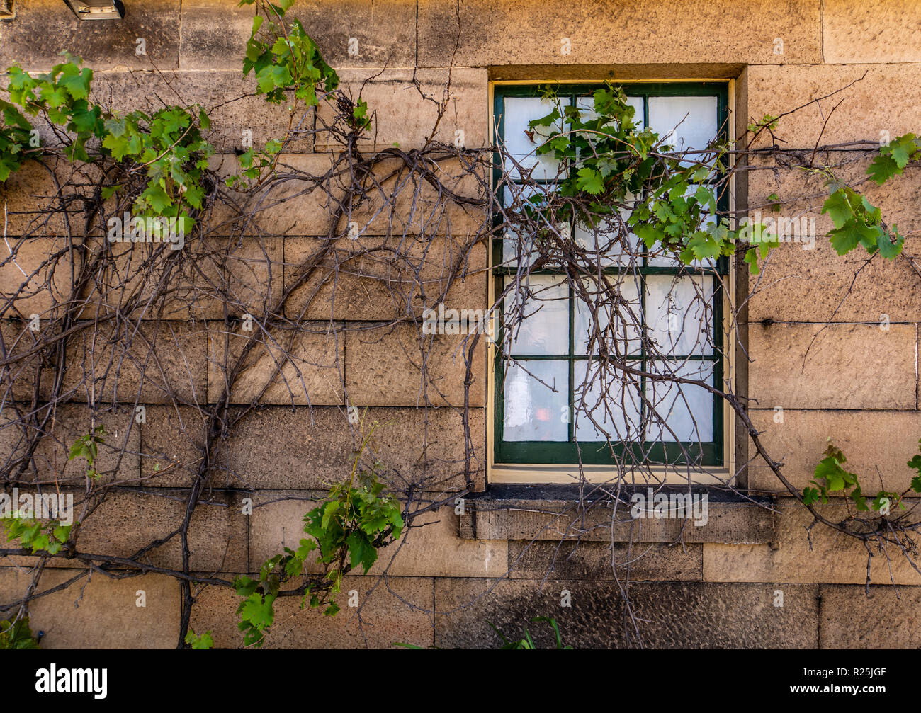 window in stone wall Stock Photo - Alamy