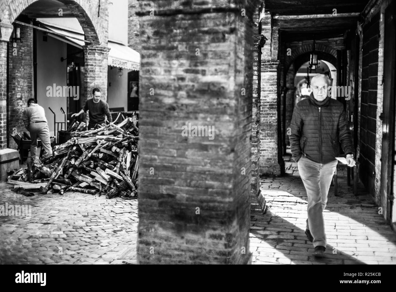 Local people in the street of Urbania, Italy, Europe Stock Photo - Alamy