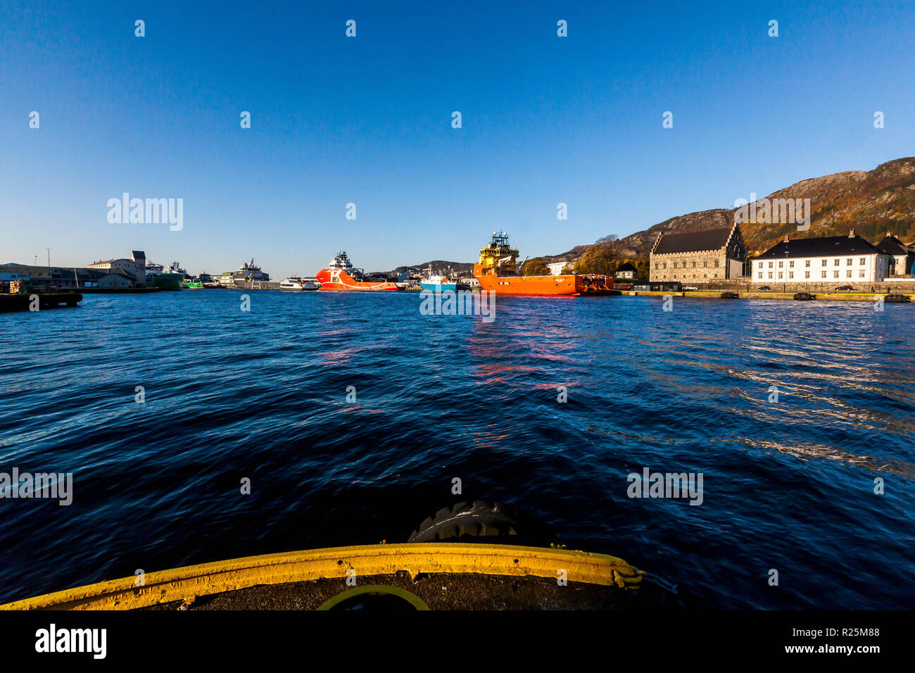 Offshore supply ships berthed in the port of Bergen, Norway Stock Photo ...
