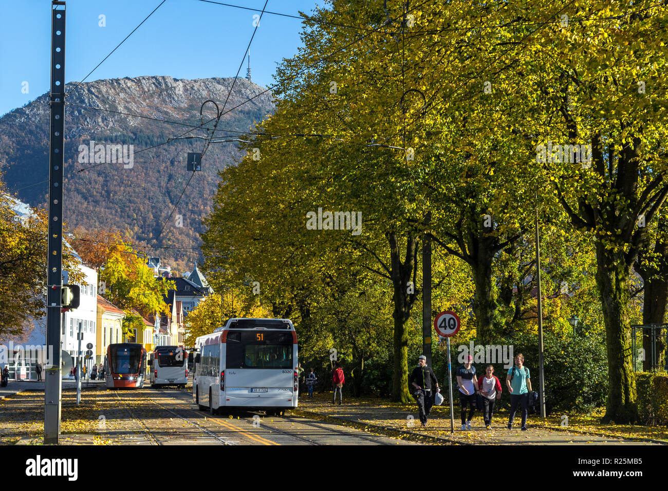 Light train Bybanen and local buses in Byparken, downtown Bergen ...