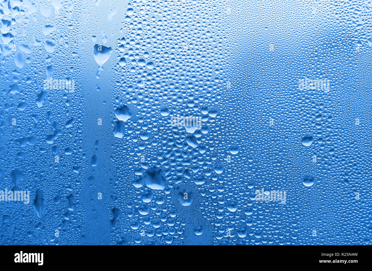 Natural water drops on window glass background Stock Photo - Alamy