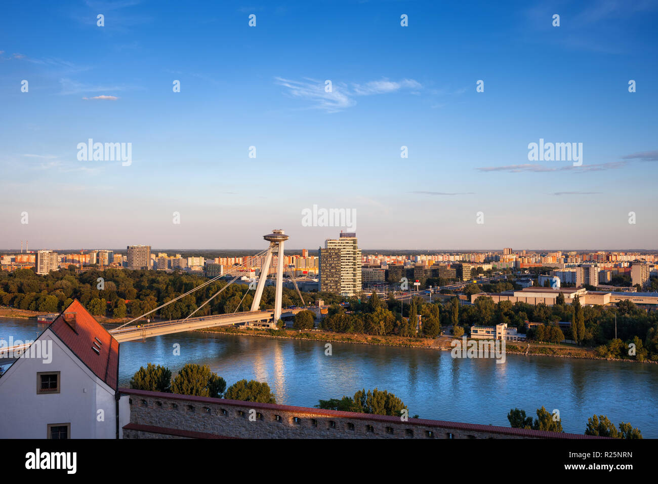 Slovakia, Bratislava city skyline at sunset, cityscape along Danube ...