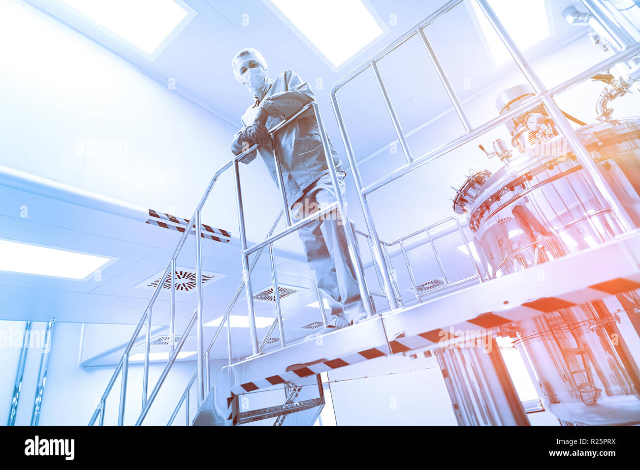 plant picture, scientist standing on ladder, crossed hands Stock Photo ...