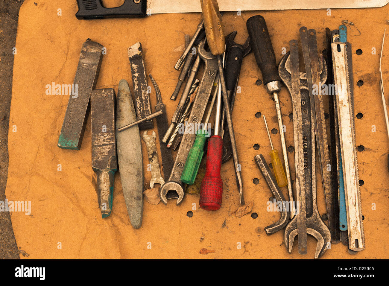 Metal people tools. Rustic iron crafts. Vintage Stock Photo - Alamy