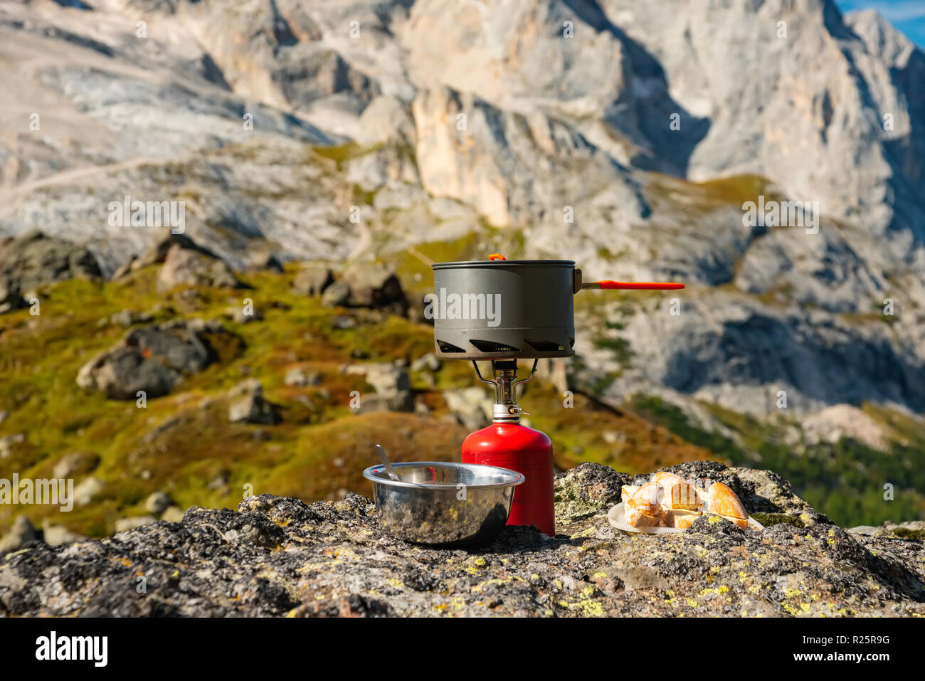 Tourist equipment and tools: camping gas on mountain background Stock ...
