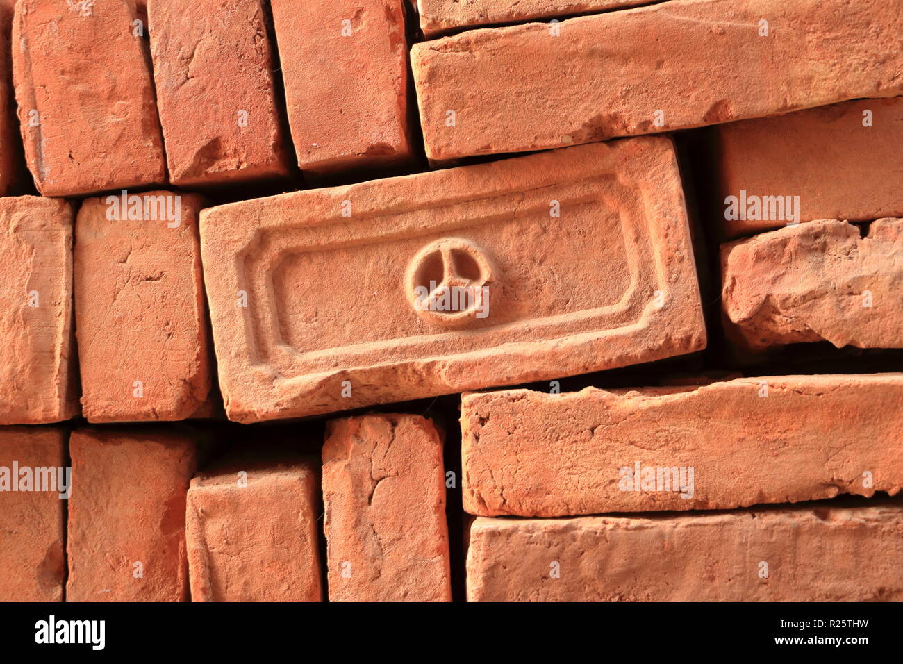 A stack of red clay bricks in Kathmandu in Nepal Stock Photo - Alamy