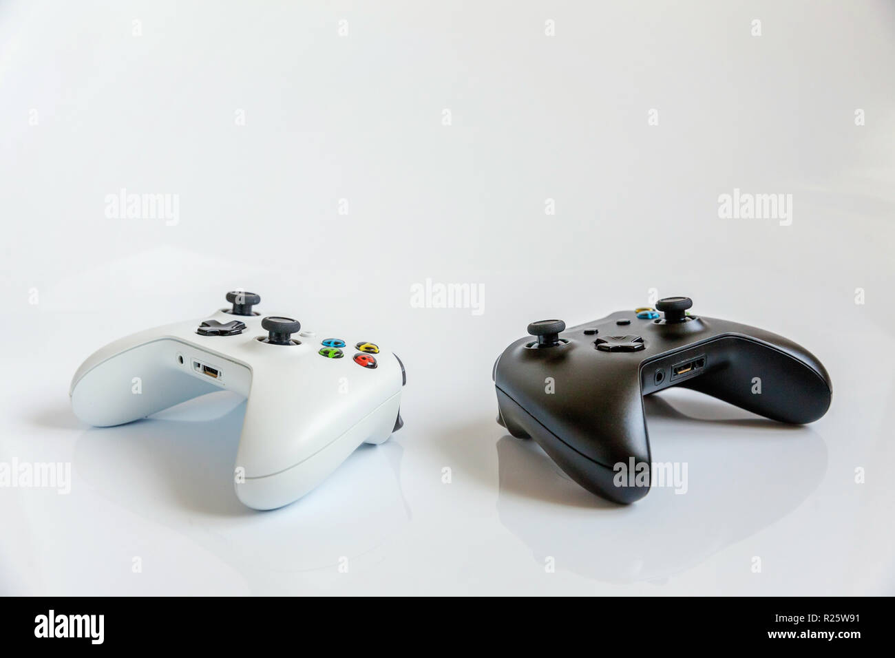 White and black two joystick gamepad, game console isolated on white ...