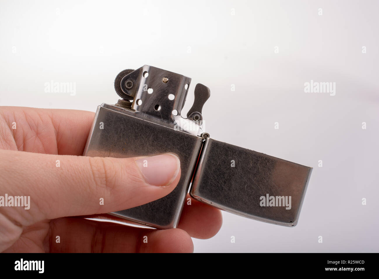 Steel lighter on an isolated background in the view Stock Photo - Alamy
