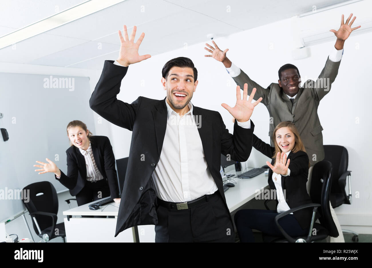 Satisfied international business team expressing satisfaction with ...