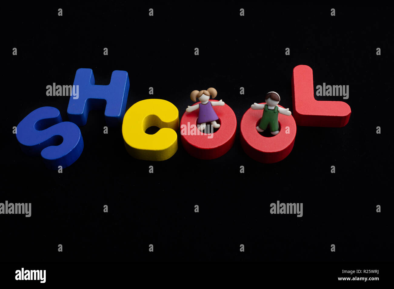 Education concept by School lettering with colorful wooden letters ...