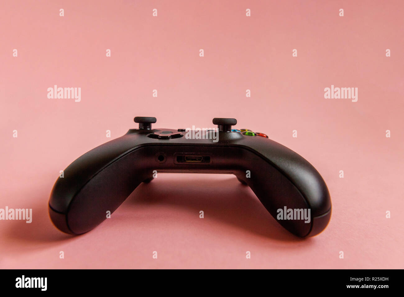 Black joystick gamepad, game console on pink colourful trendy modern ...