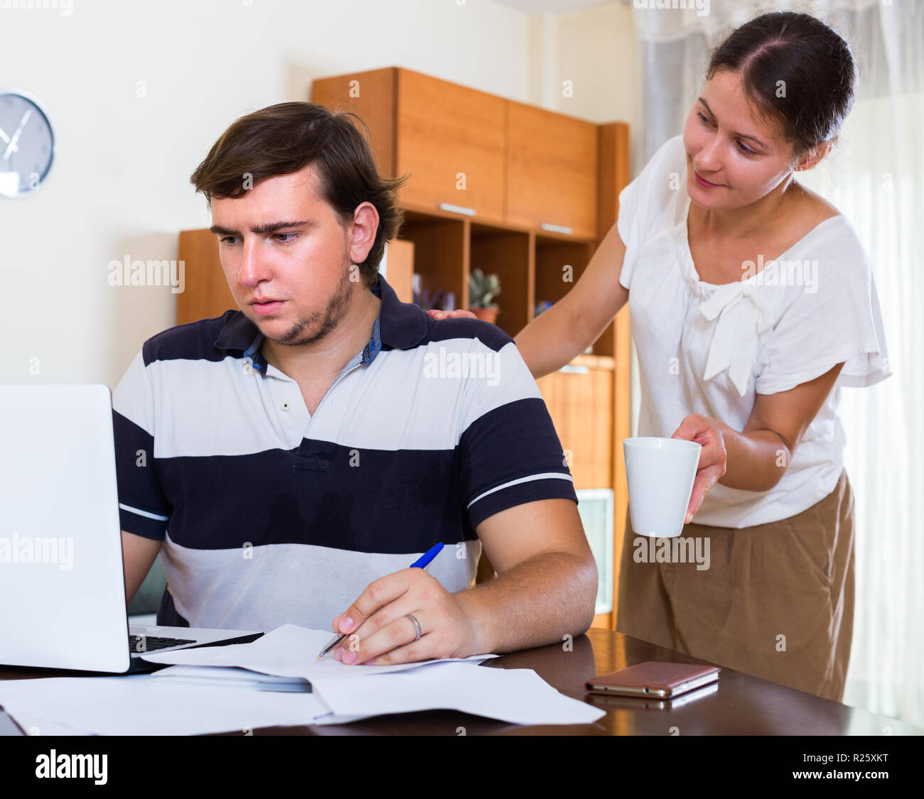 Workaholic couple hi-res stock photography and images - Alamy
