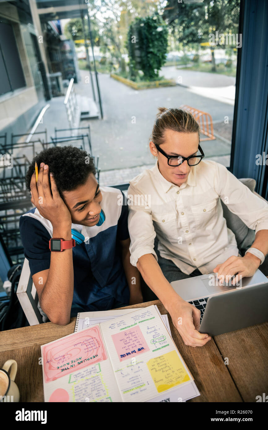 Nice young men studying together for the exam Stock Photo - Alamy