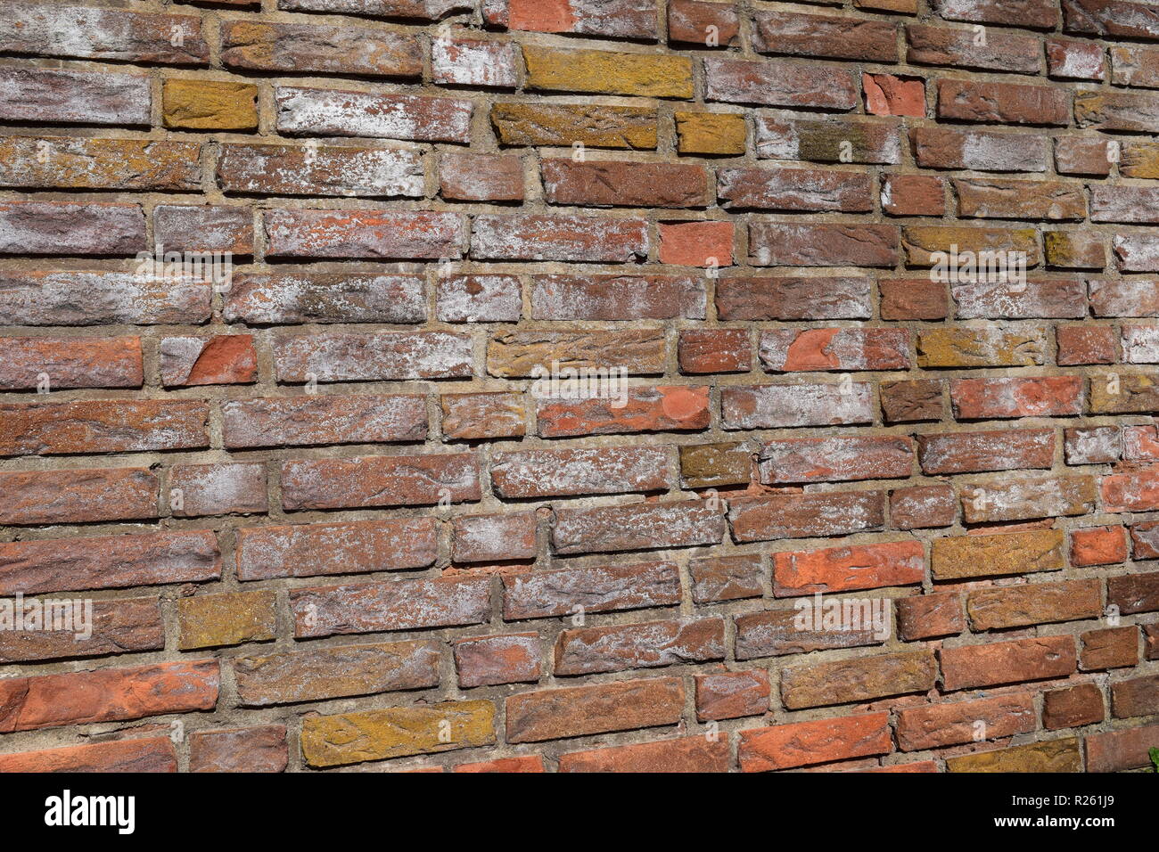 Old red brick wall showing signs of age and decay mortar Stock Photo ...