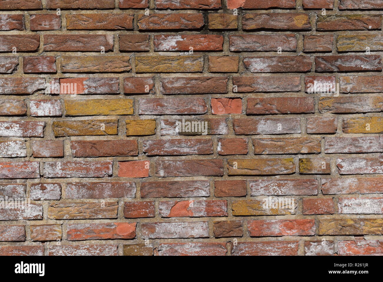 Old red brick wall showing signs of age and decay mortar Stock Photo ...