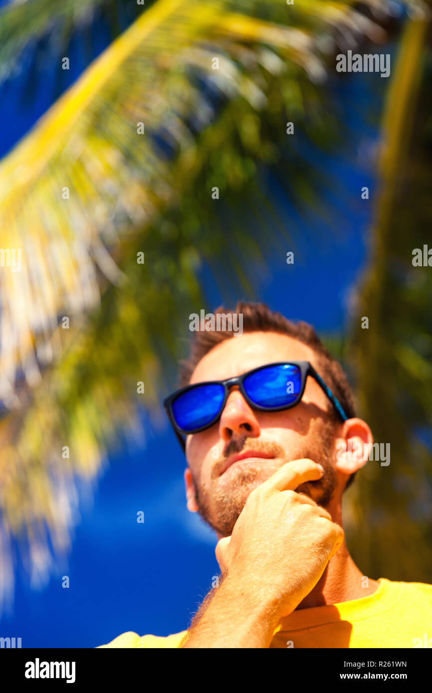 Active lifestyle and travel concept: Excited traveler man enjoy ...