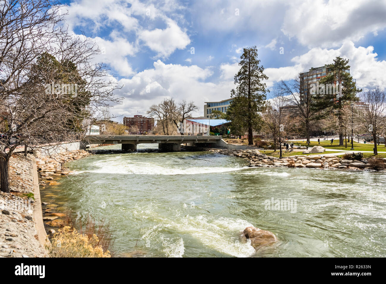 Reno, Nevada skyline as seen from the shoreline of Truckee river ...