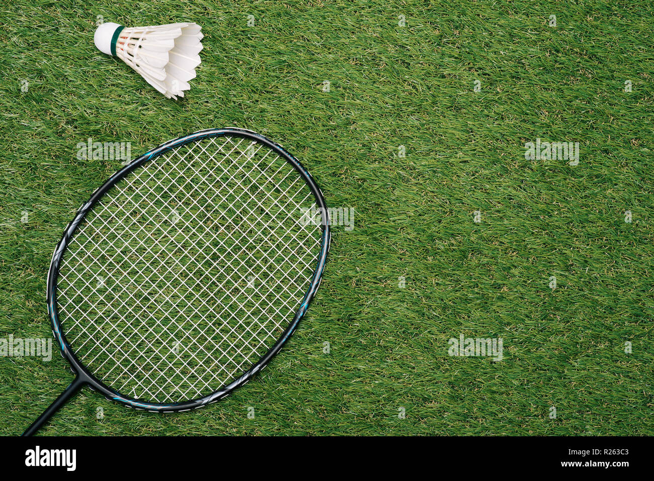 Badminton racket on the green , top view Stock Photo - Alamy
