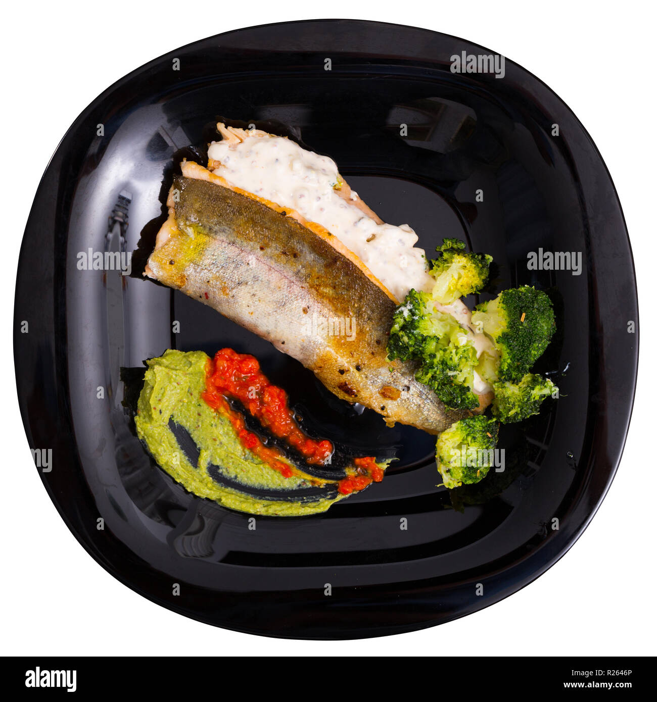 Delicious fried brook trout fillets with broccoli and tartare saucee ...