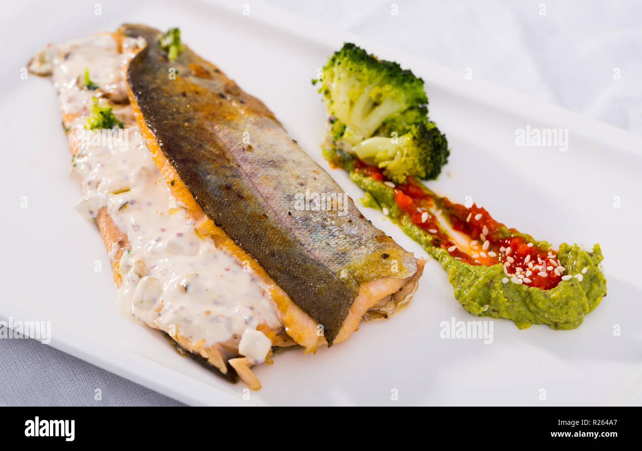 Healthy lunch - grilled fillets of trout served with boiled broccoli ...