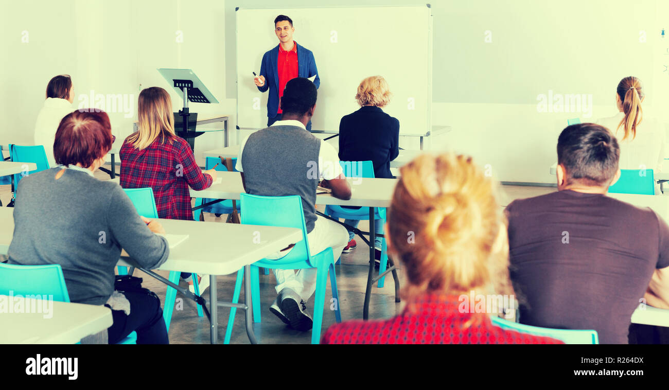 Teacher giving instruction to class hi-res stock photography and images ...