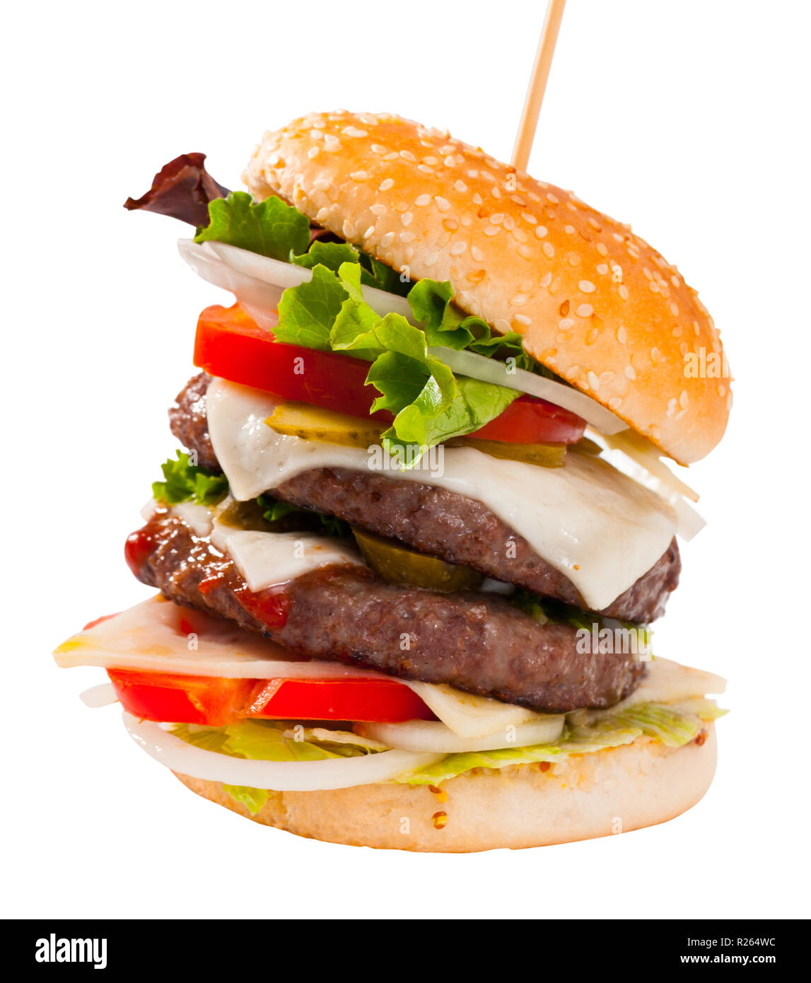 double-decker grilled burger with beef, tomato, cheese, cucumber and ...