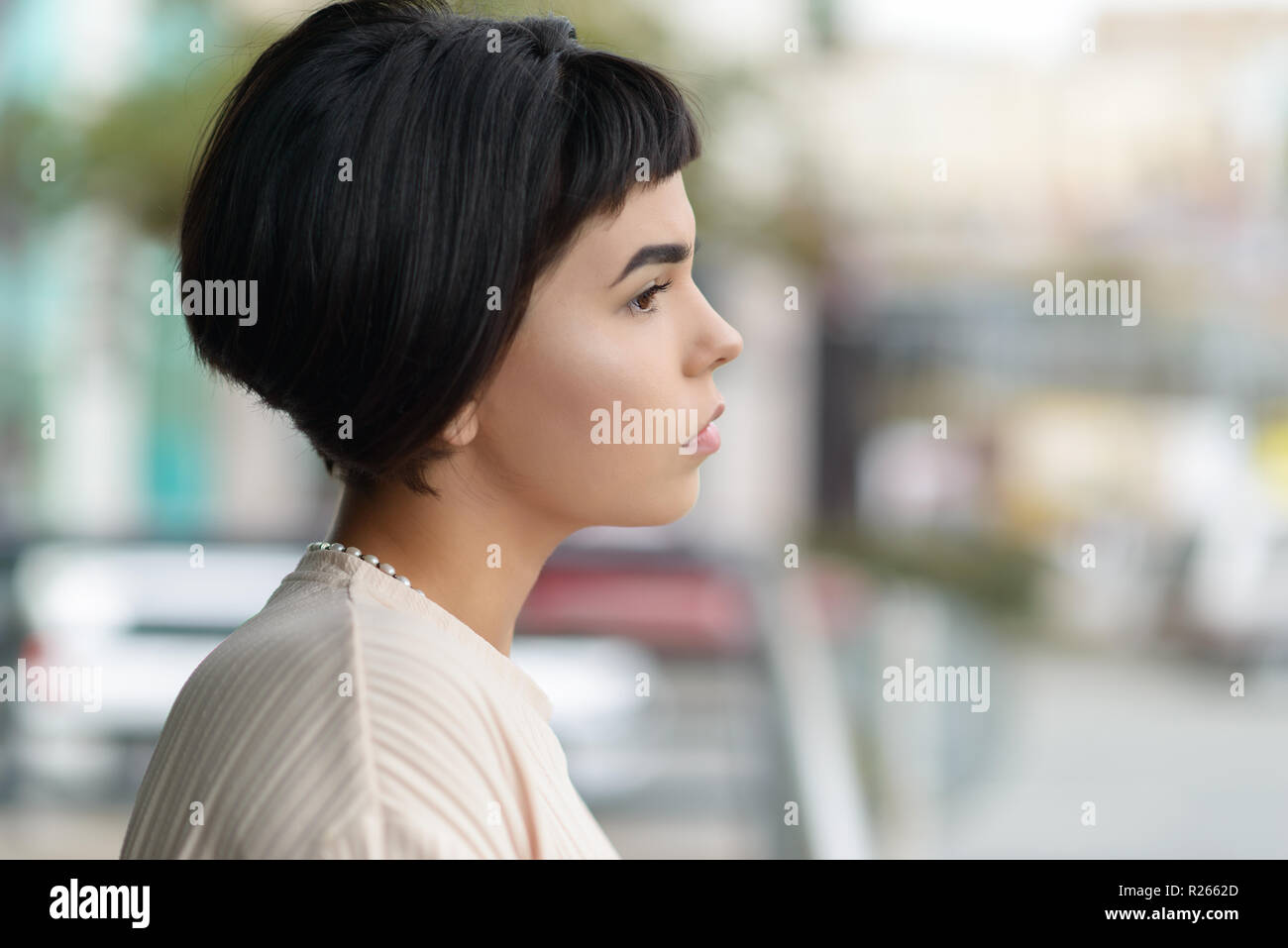 Girl in profile. Portrait of attractive young woman Stock Photo - Alamy
