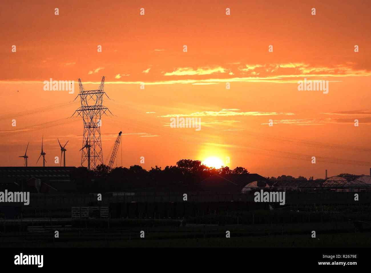 Colorful sunset power lines silhouetted hi-res stock photography and ...